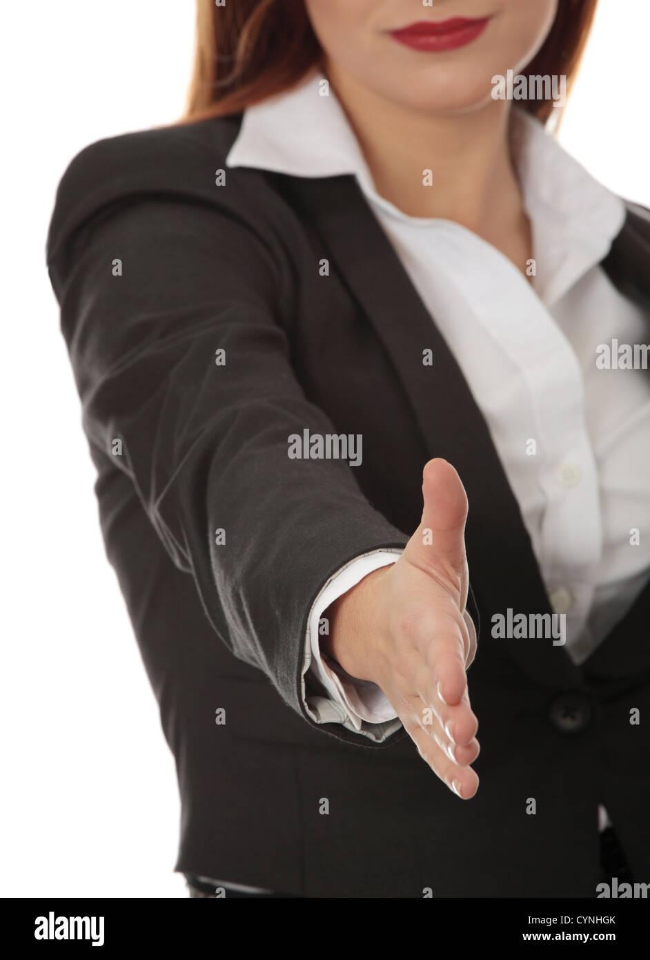 Businesswoman with an open hand ready for handshake Stock Photo - Alamy