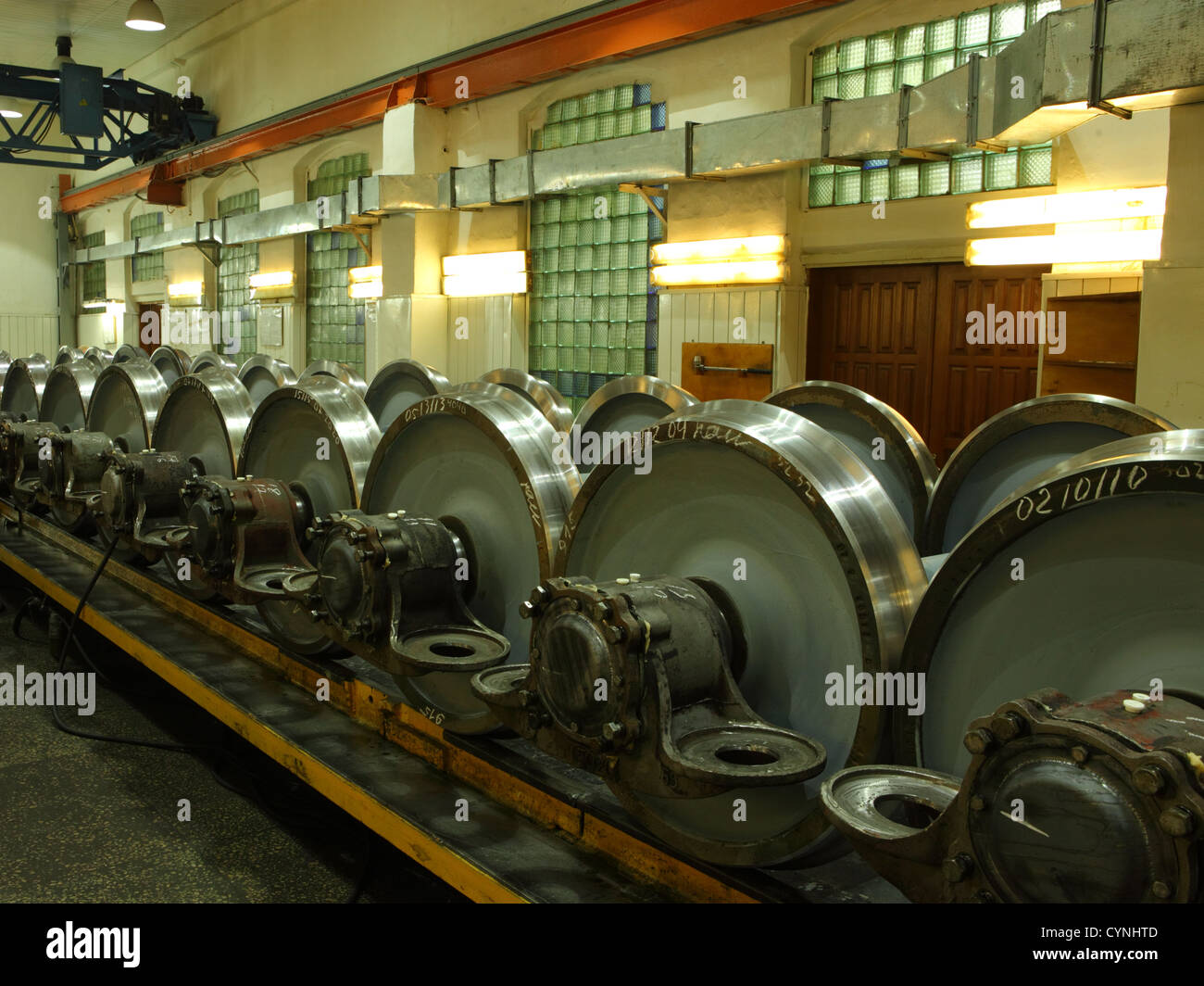 Mass transit, train wheel engineering on Repair Plant Stock Photo - Alamy
