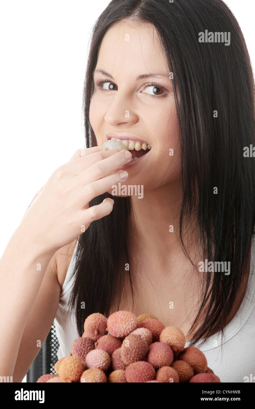Eating litchi fruits Stock Photo - Alamy