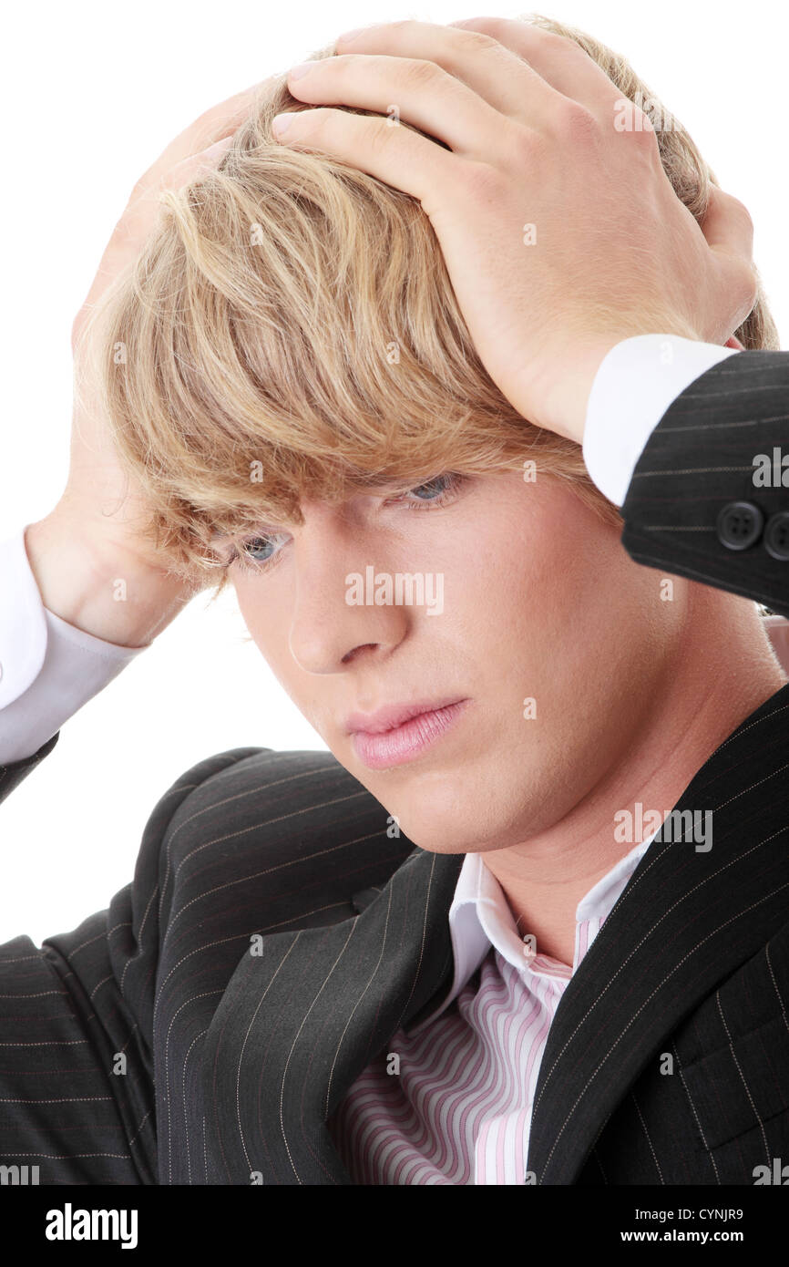 Businessman with a big headache Stock Photo - Alamy