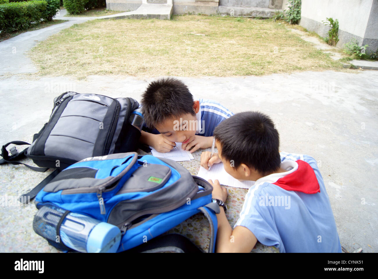 China's primary school students in doing his homework Stock Photo - Alamy