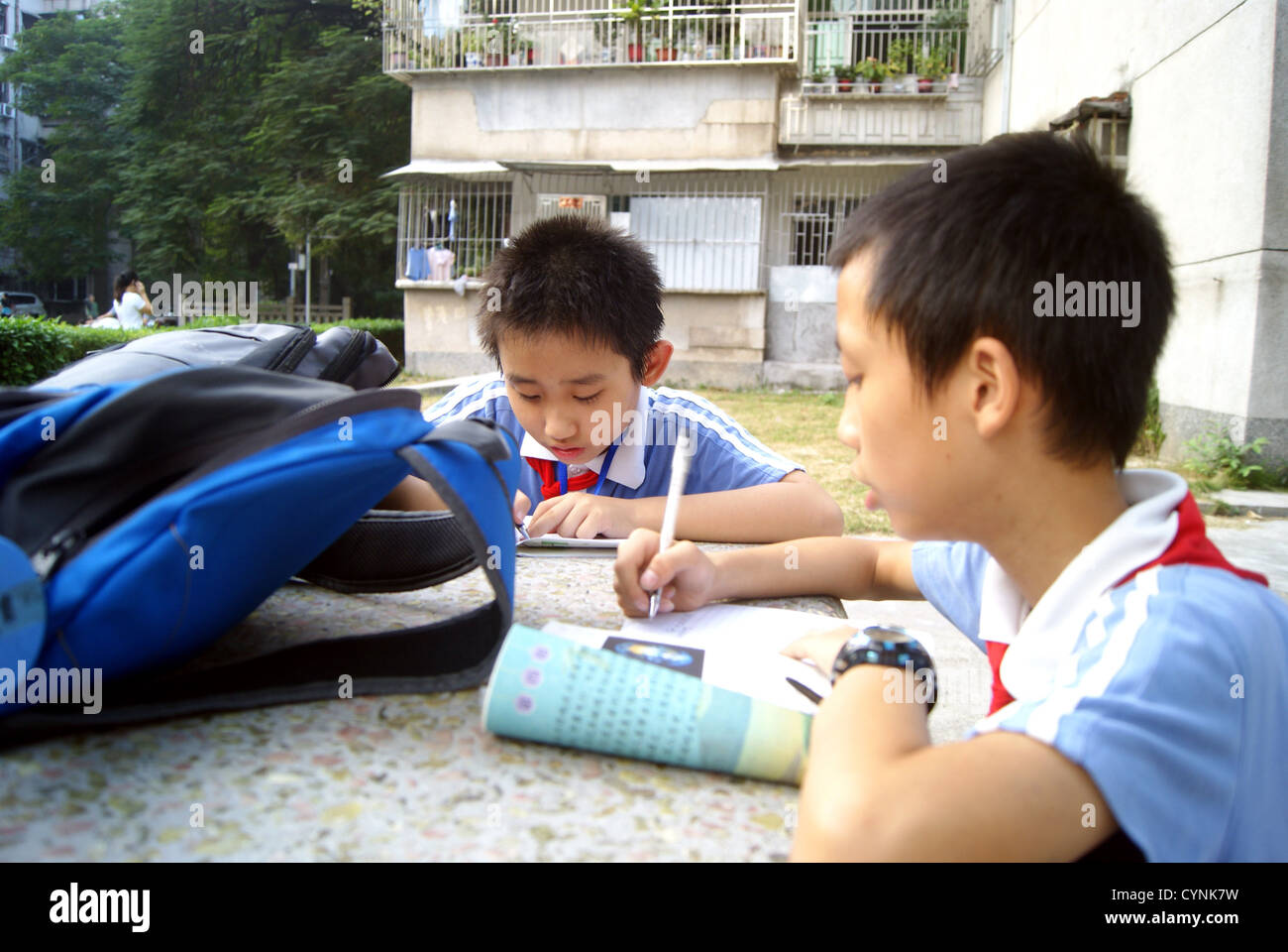 China's primary school students in doing his homework Stock Photo - Alamy