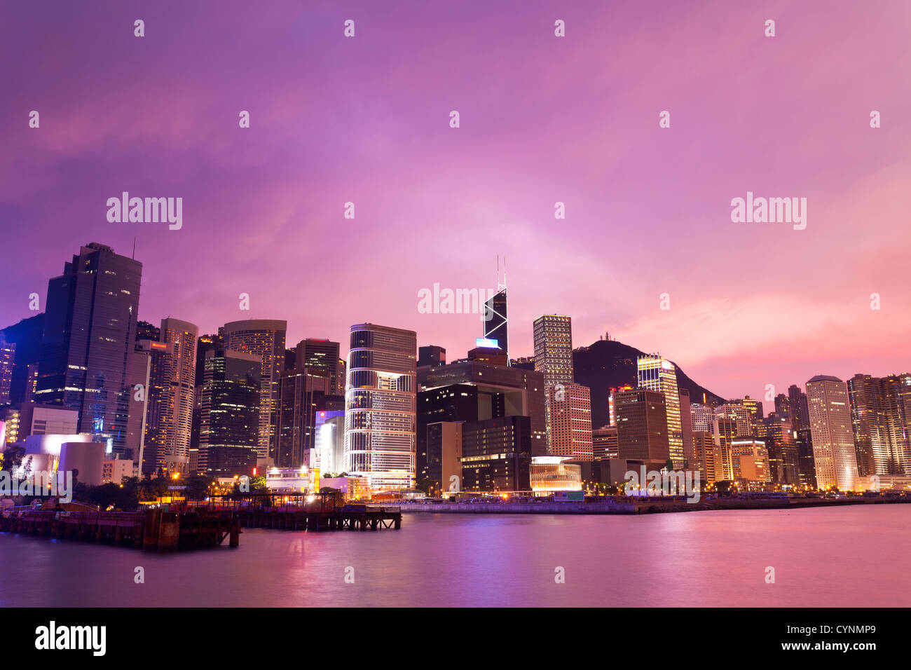 Sunset in Hong Kong with office buildings background Stock Photo - Alamy