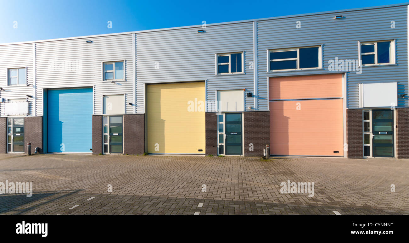 business units for small companies with colorful roller doors Stock ...