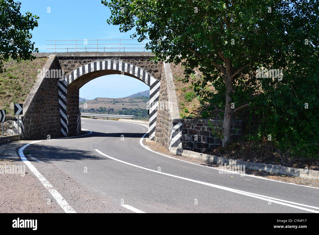 small overpass over a winding road Stock Photo - Alamy