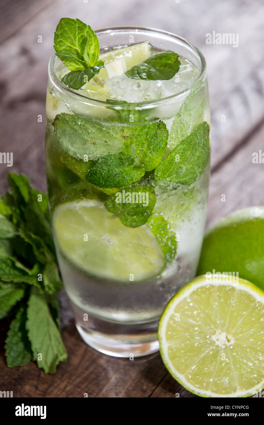 Glass with fresh made Mojito on wood Stock Photo - Alamy