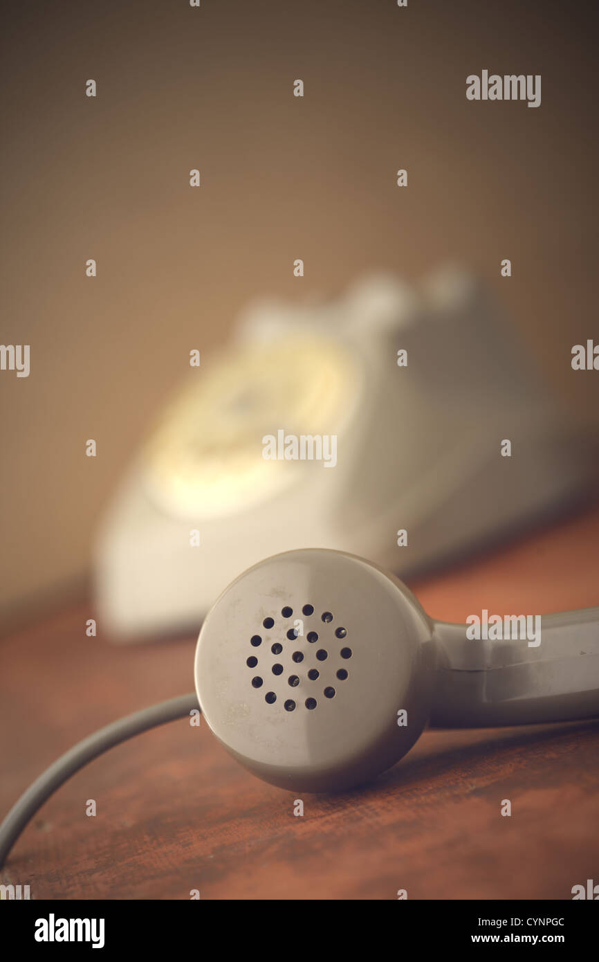 Old-fashioned phone with receiver off Stock Photo - Alamy