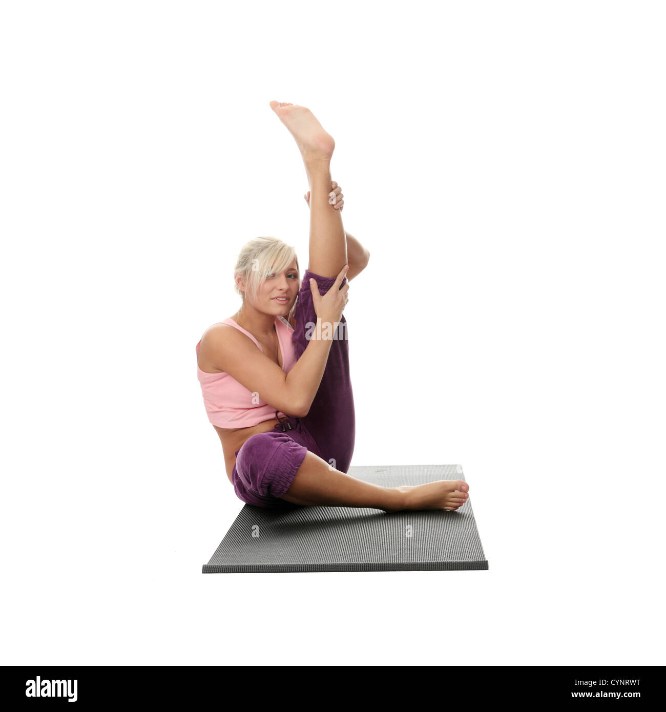 Young woman exercising isolated on white background Stock Photo - Alamy