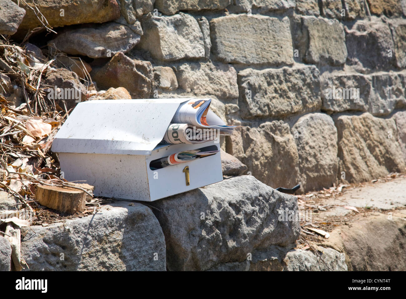 mailbox full of newspapers and mail Stock Photo - Alamy