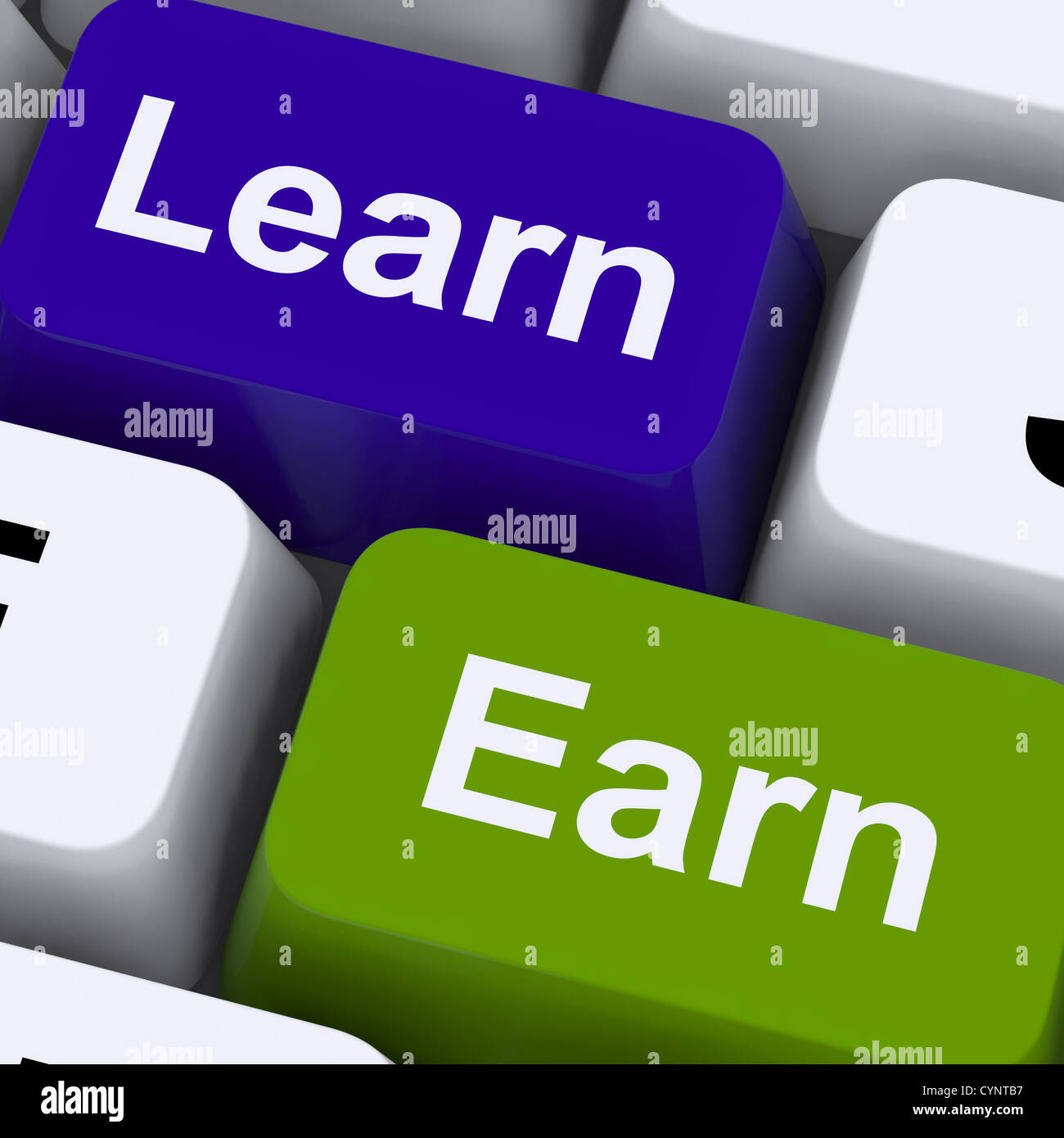 Learn And Earn Computer Keys Shows Working Or Studying Stock Photo - Alamy