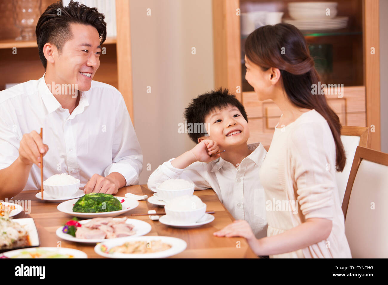 Chinese father and son eating rice hi-res stock photography and images ...