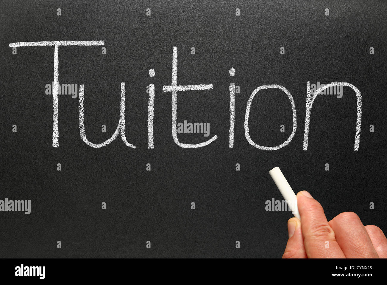 Tuition, written on a blackboard Stock Photo - Alamy