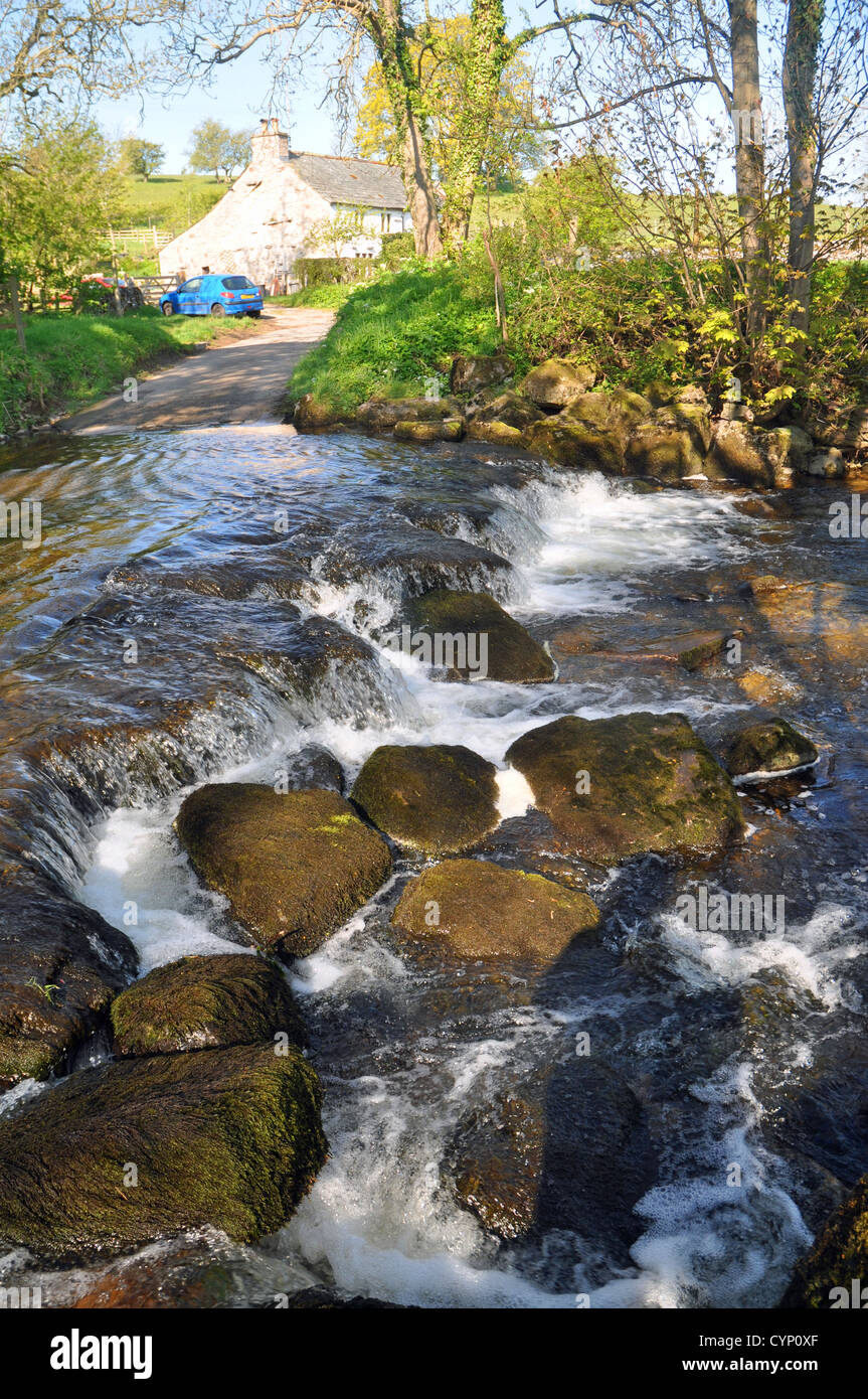A ford in a stream near the town Stock Photo - Alamy