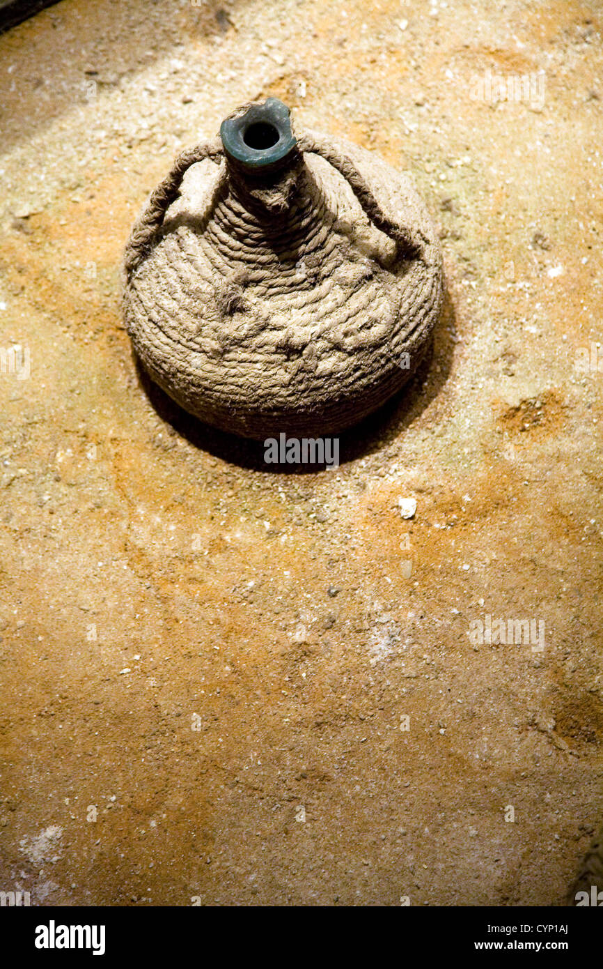 ancient carafe on the floor sand of a cellar Stock Photo - Alamy