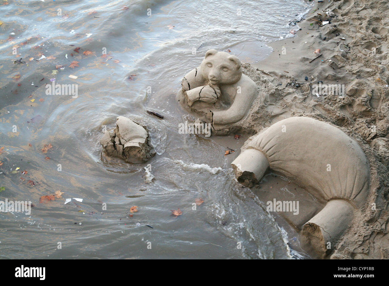 sand bear and sofa flooded Stock Photo - Alamy