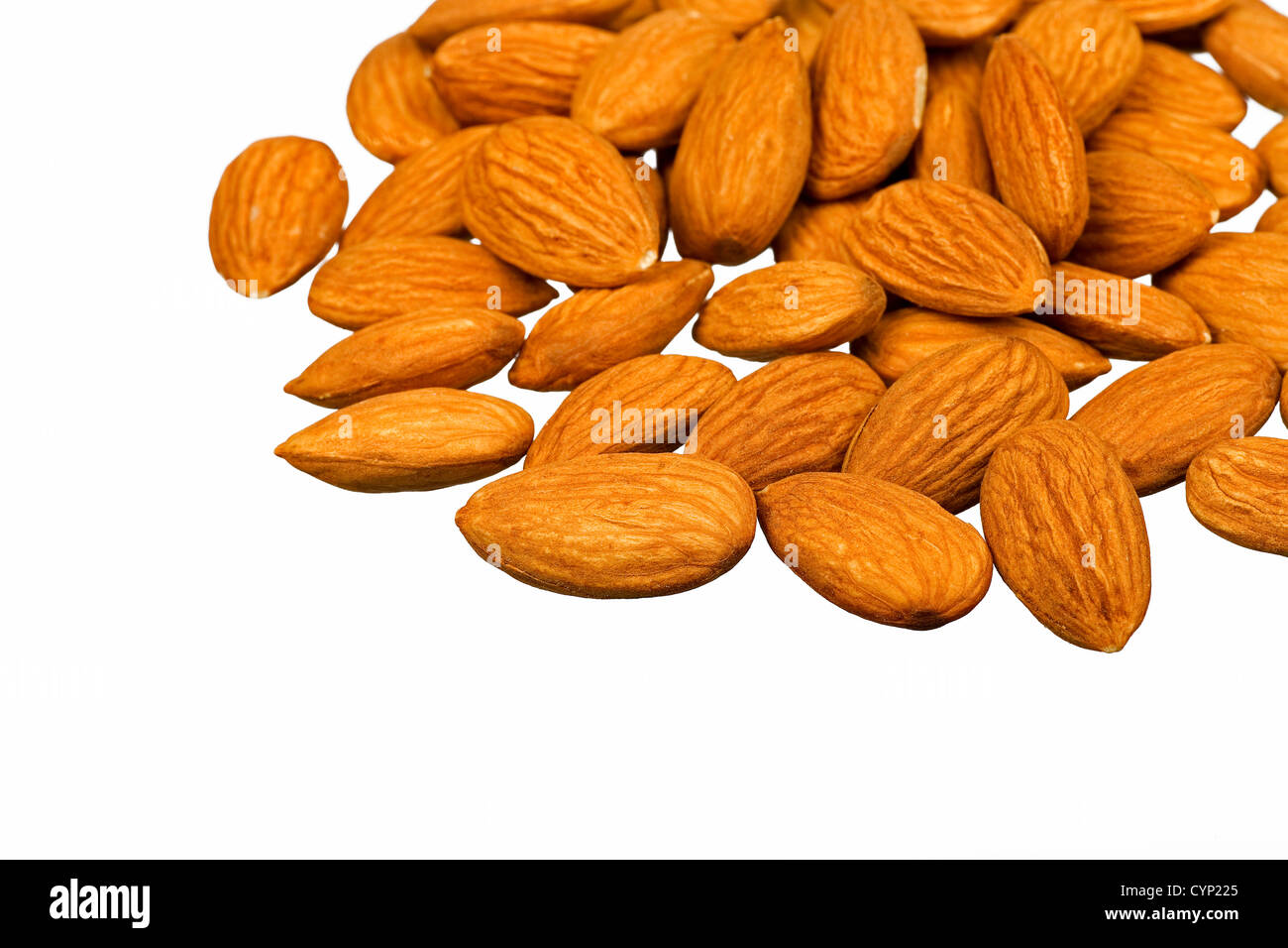 whole almonds on white background Stock Photo - Alamy