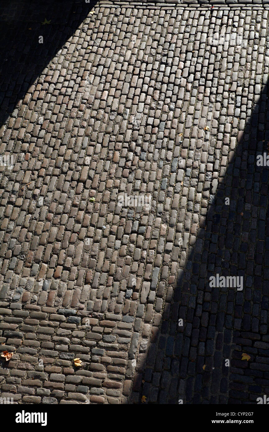 cobblestone paving in london tower Stock Photo - Alamy