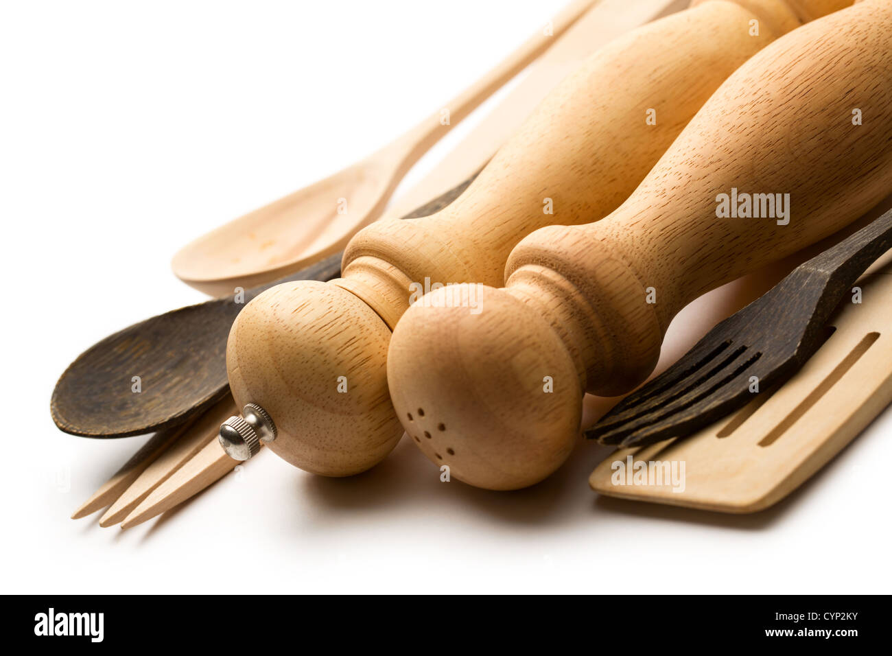 Wooden salt and pepper set with kitchen utensils Stock Photo - Alamy
