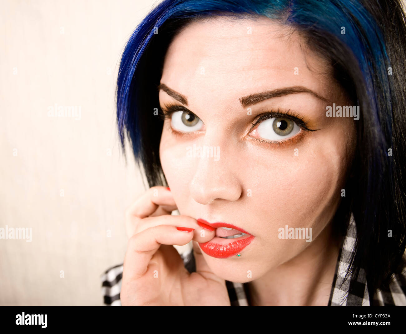 Woman coy shy expression hi-res stock photography and images - Alamy