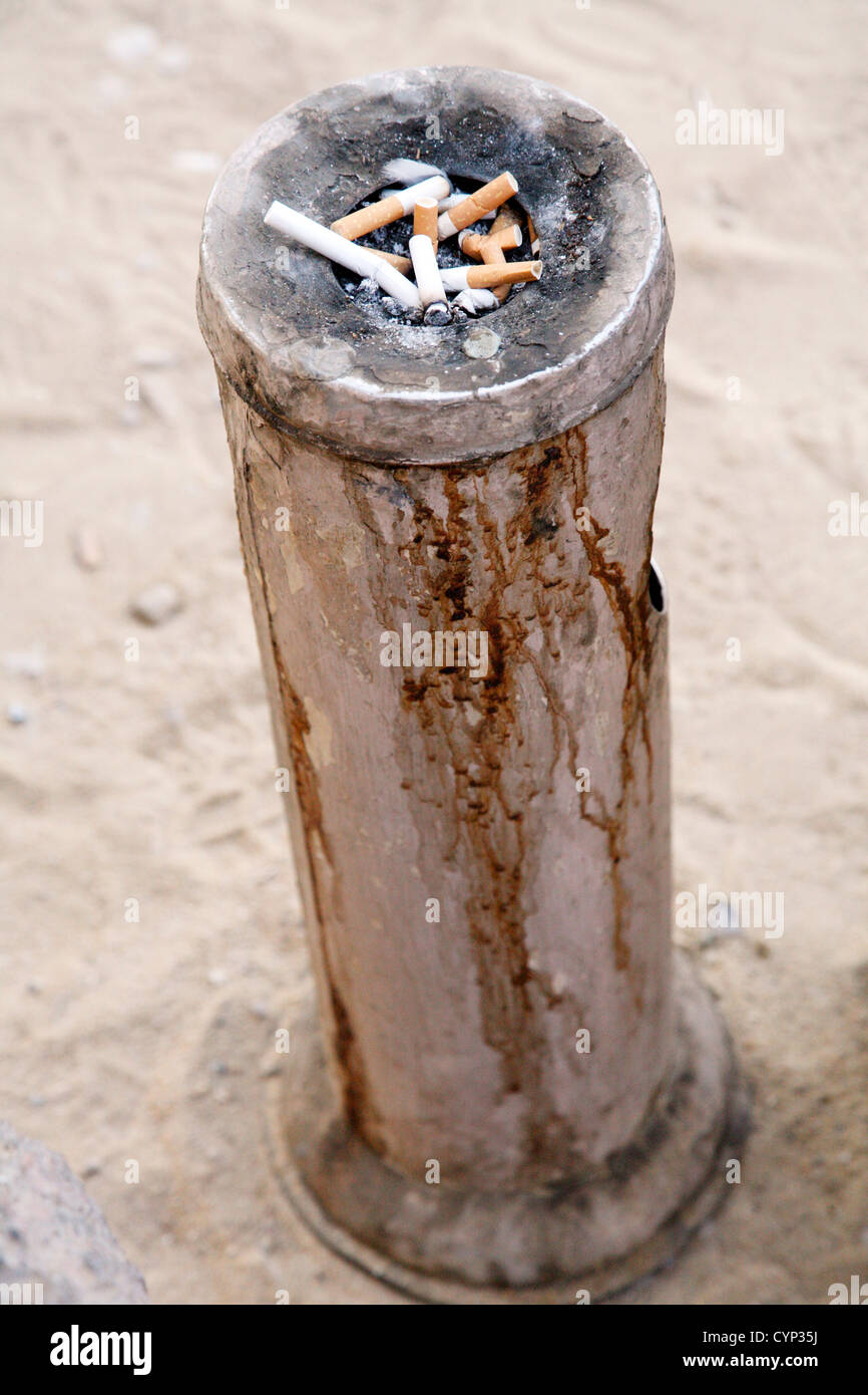 very dirty ash try outside on the sand Stock Photo - Alamy