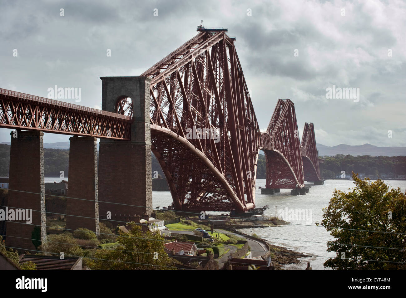 The newly painted (2012) Forth Bridge pictured from the shore of the ...
