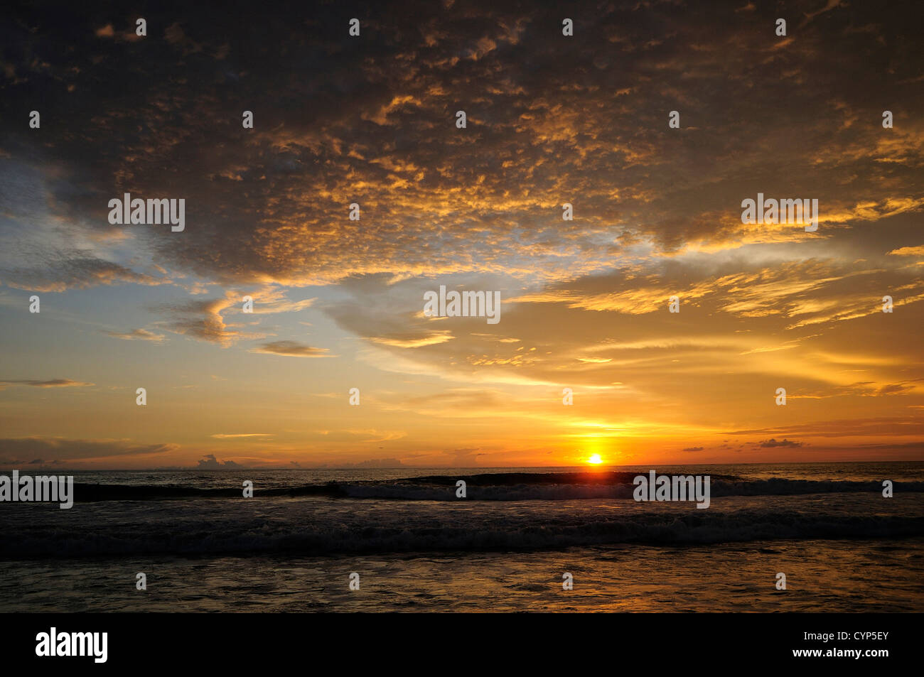 Puerto Escondido Sunset over Playa Zicatela with waves breaking on ...