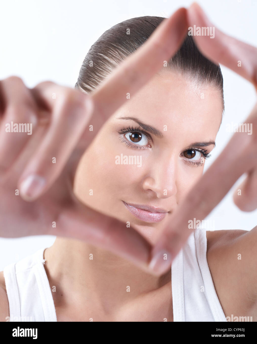 Beaut girl make hand frame Stock Photo - Alamy