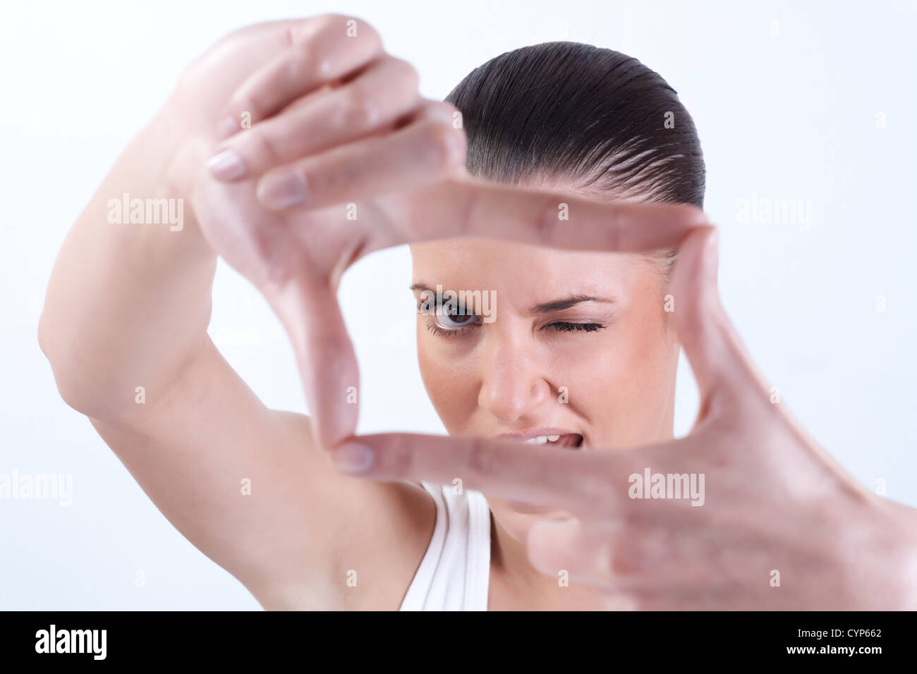 Beaut girl make hand frame Stock Photo - Alamy