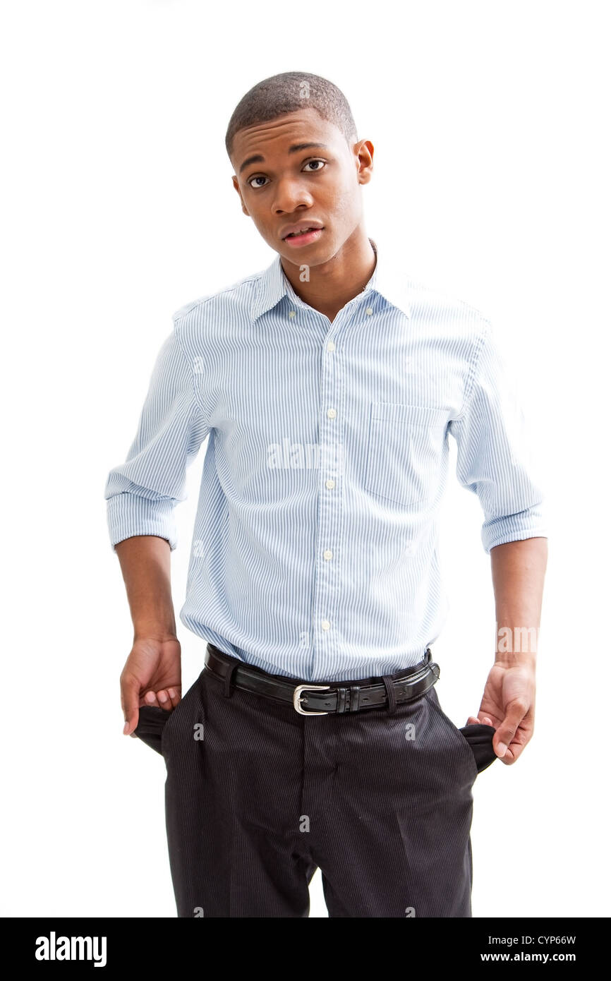 Broke young African business man standing pulling out his pocket ...