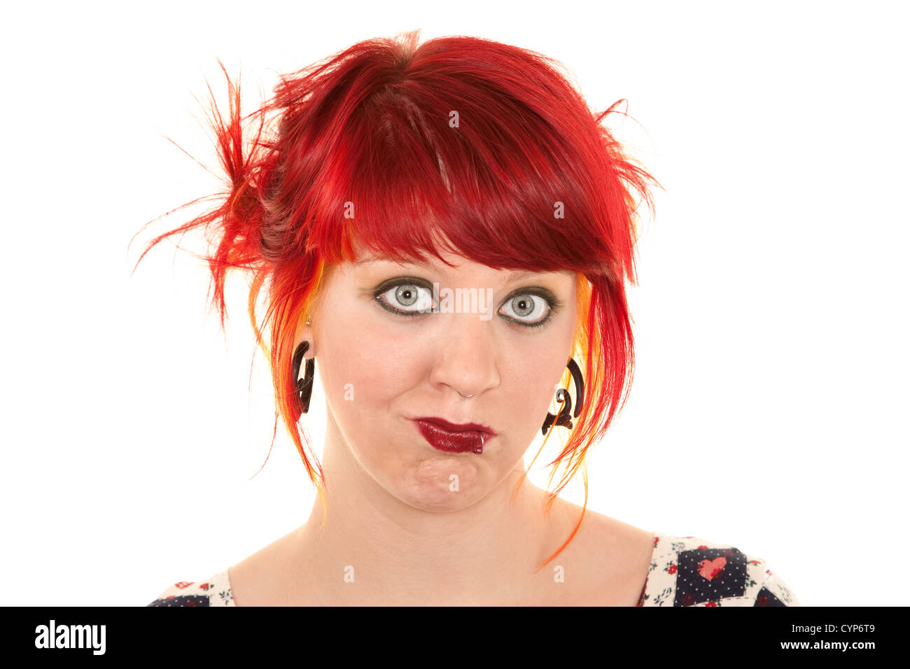 Pretty punky girl with brightly dyed red hair Stock Photo - Alamy