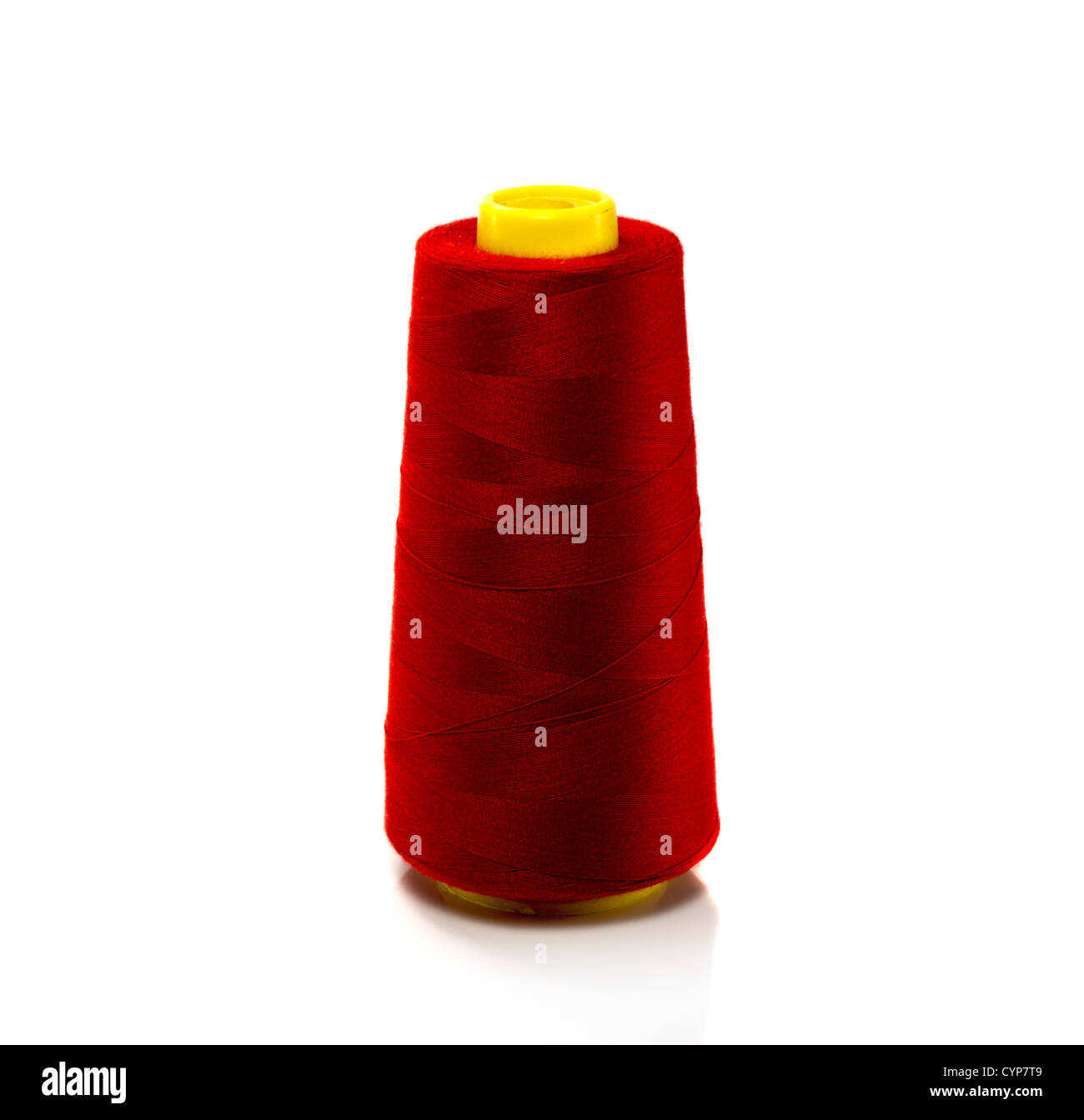 red bobbin with thread isolated on white Stock Photo - Alamy