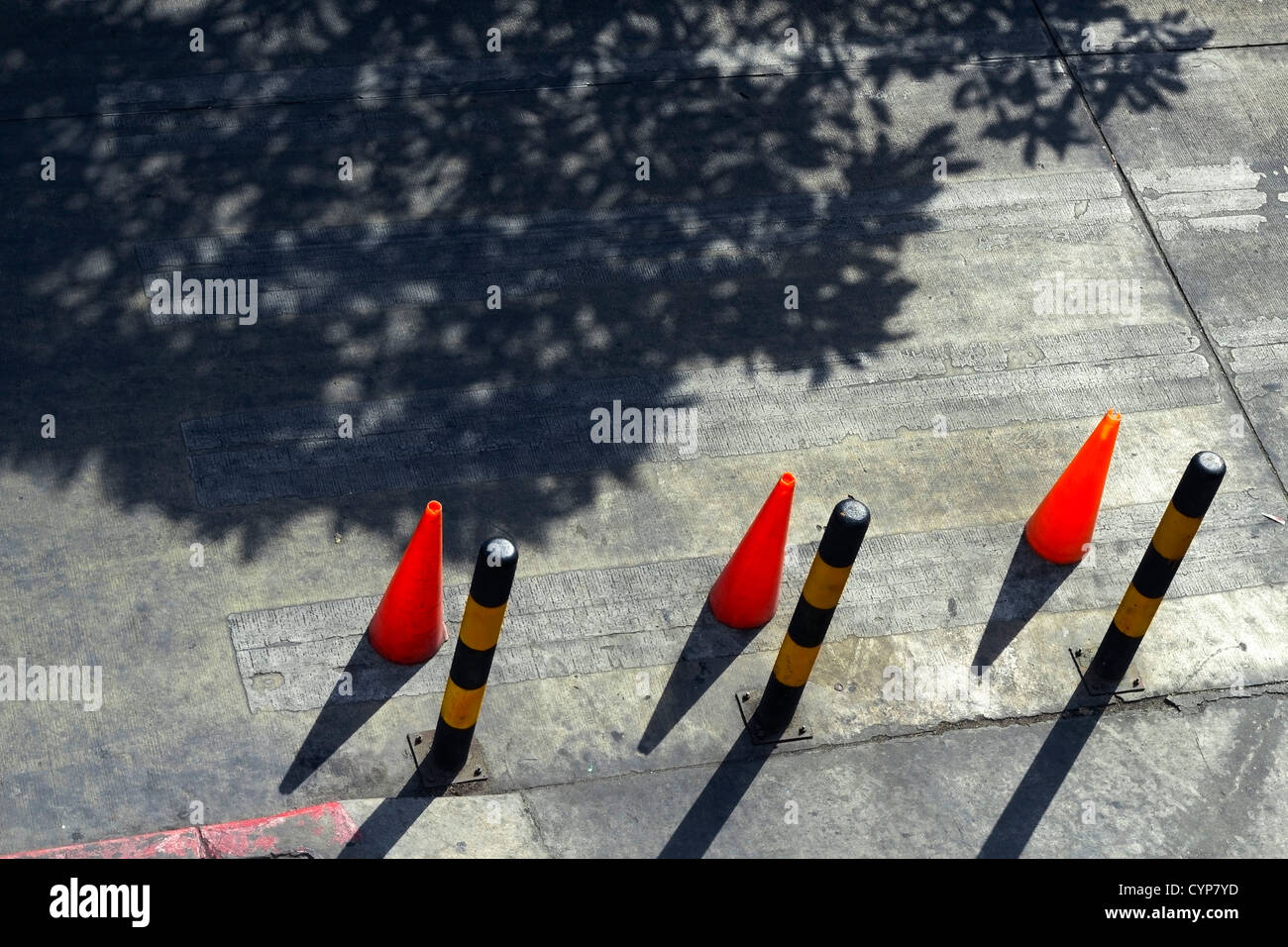Traffic cones and stanchions in a parking lot, Thailand Stock Photo - Alamy