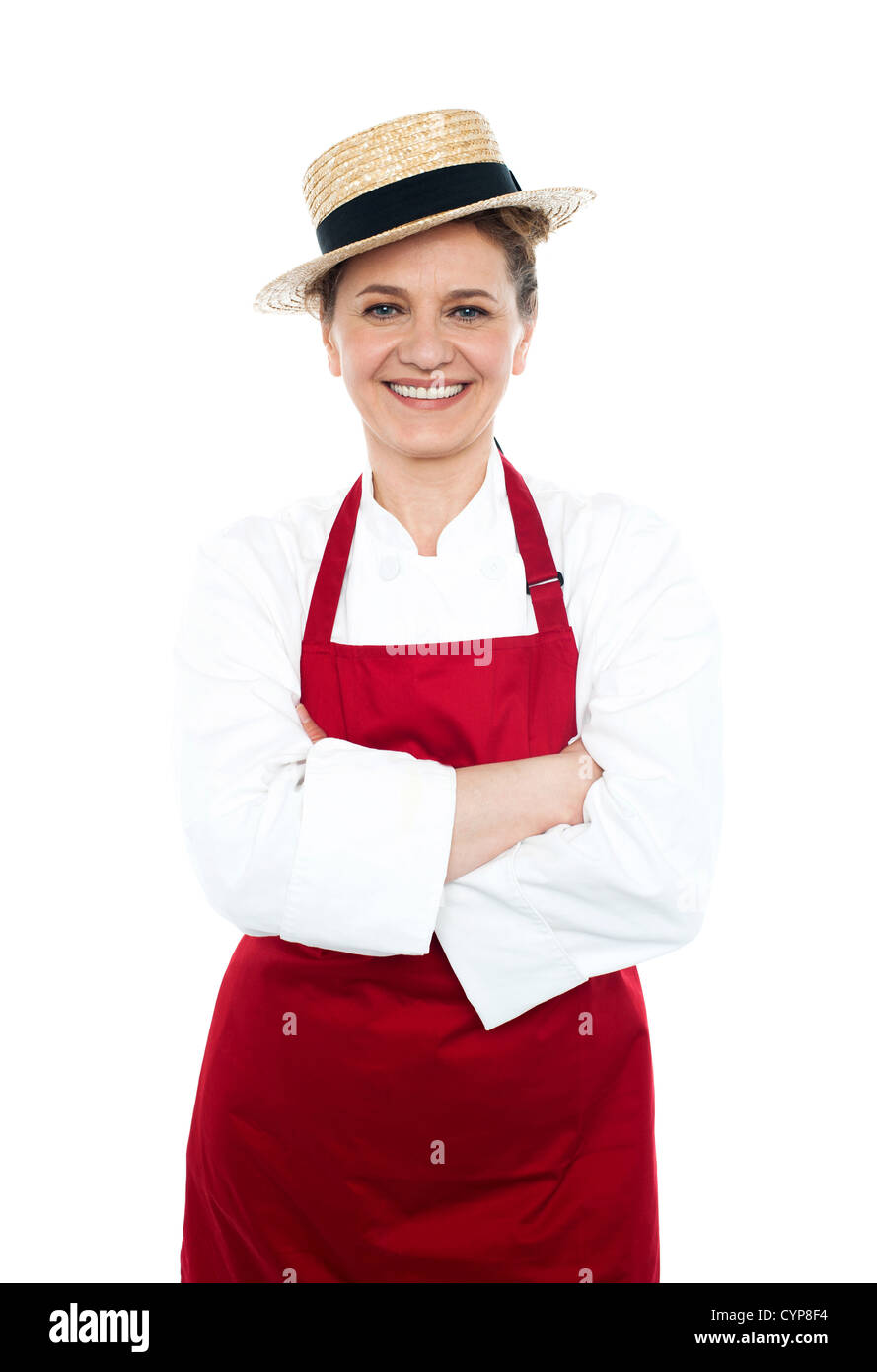 Lady cook in white red uniform wearing trendy hat and posing with ...