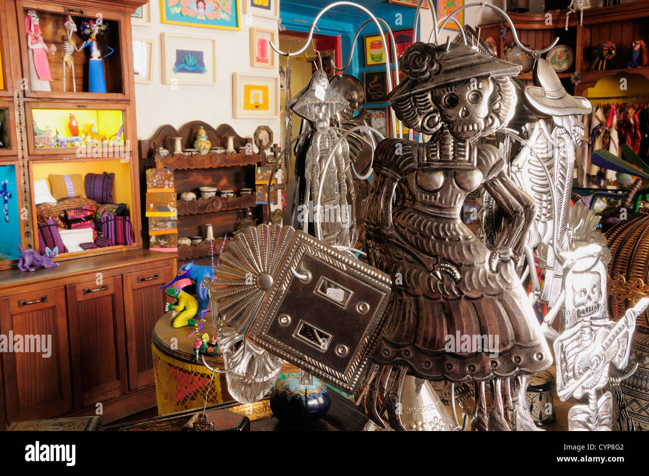 Shop interior with hojalata tin artwork displayed for sale American ...