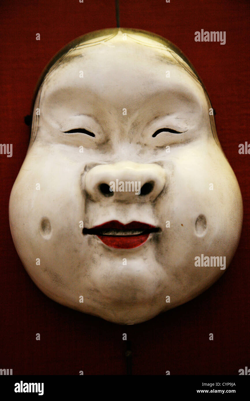 front view of an oriental mask Stock Photo - Alamy