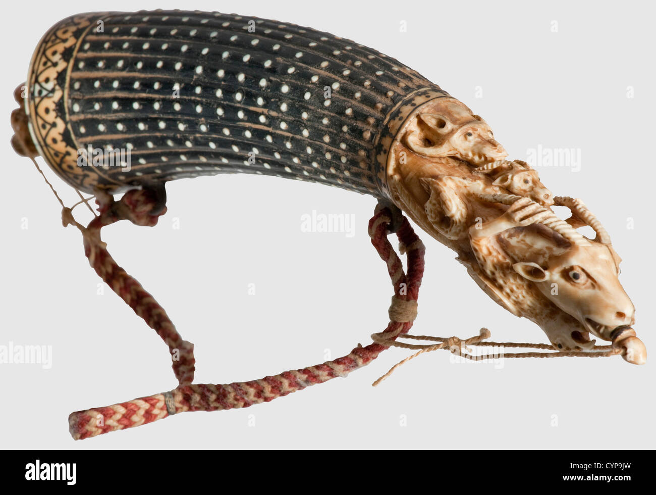An Indian powder flask, 19th century. Fluted ebony body with continuous ...