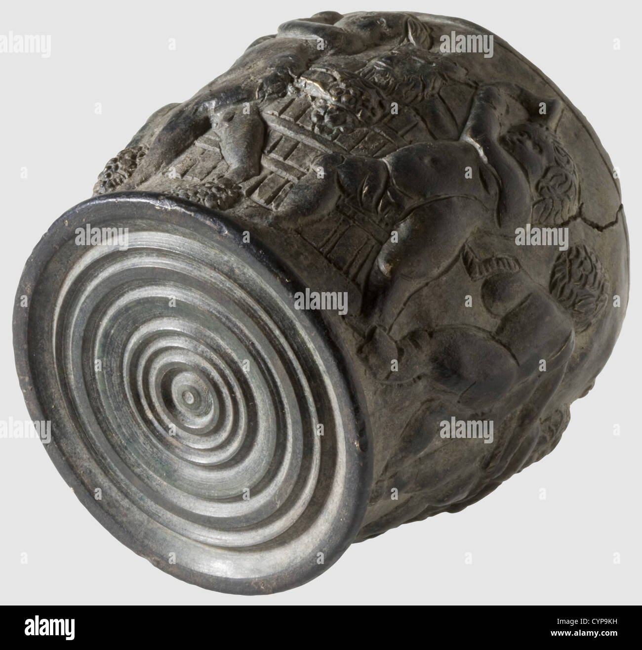 A Roman cup with relief decoration, 1st/2nd century A.D. Bronze with ...