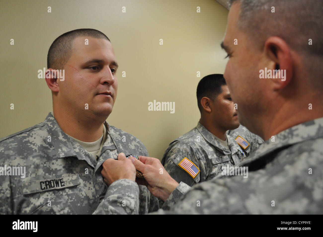 Col. Chris Sharpsten, commander of the 82nd Sustainment Brigade, awards ...