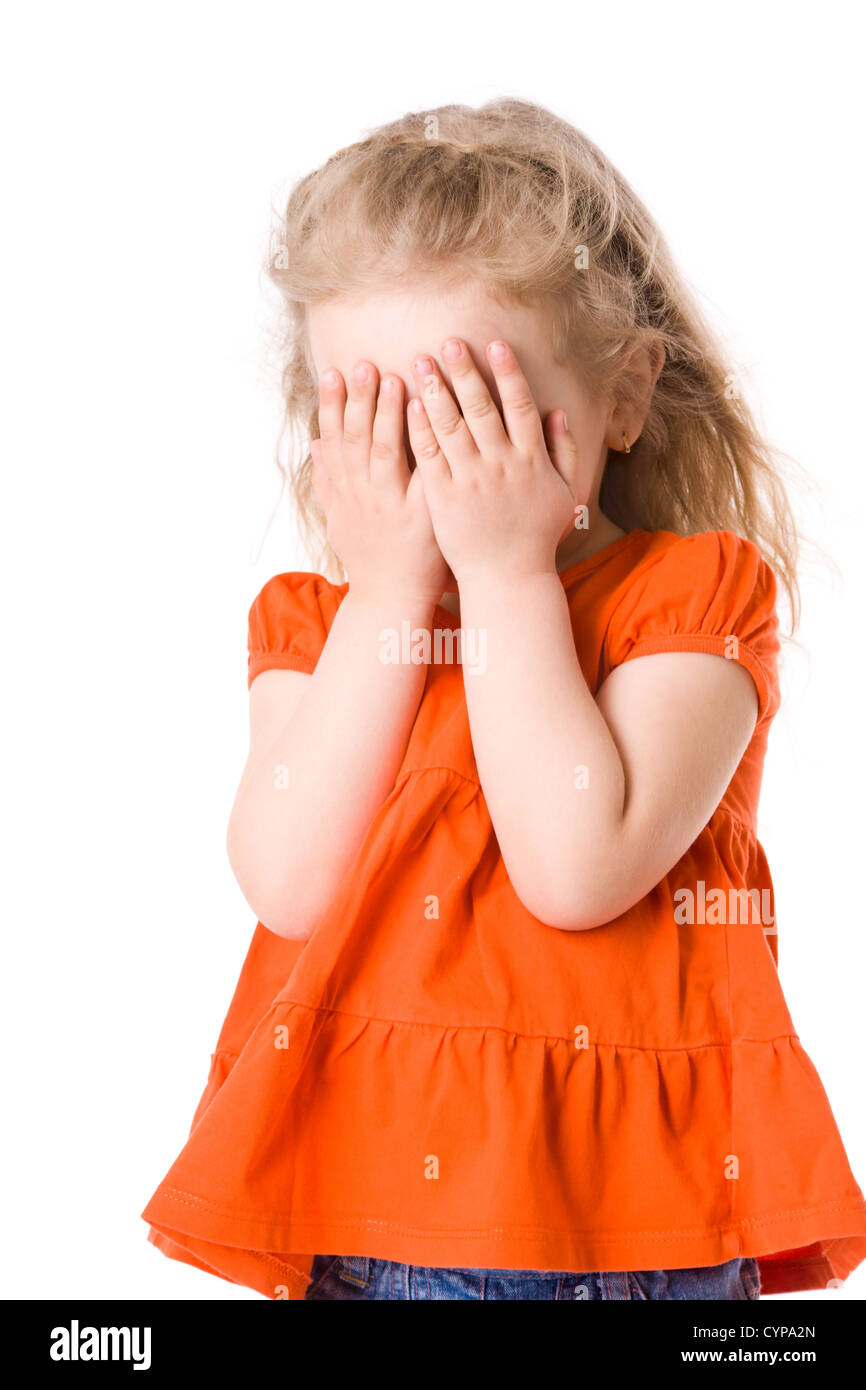 Little scared girl hiding face isolated on white Stock Photo - Alamy