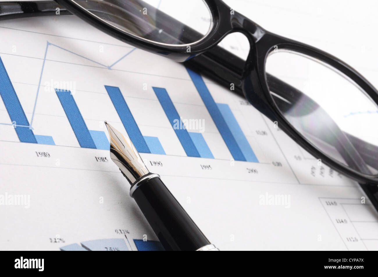 paperwork with diagram and pen showing success Stock Photo - Alamy