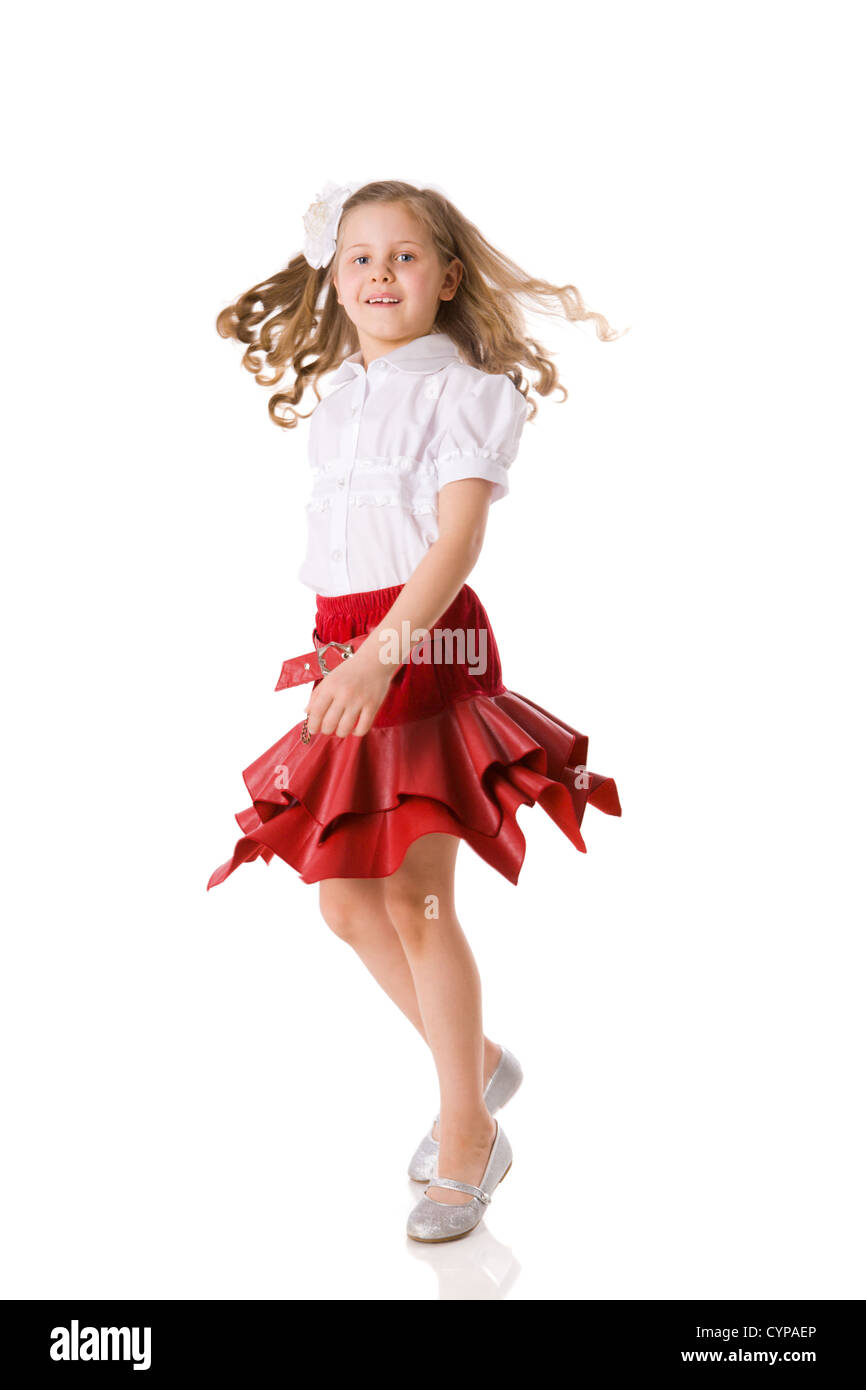 Cheerful girl spinning on floor isolated on white Stock Photo - Alamy