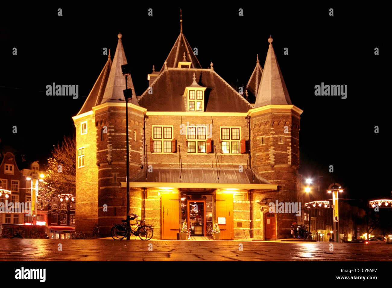 Medieval De Waag building in Amsterdam the Netherlands at night Stock ...