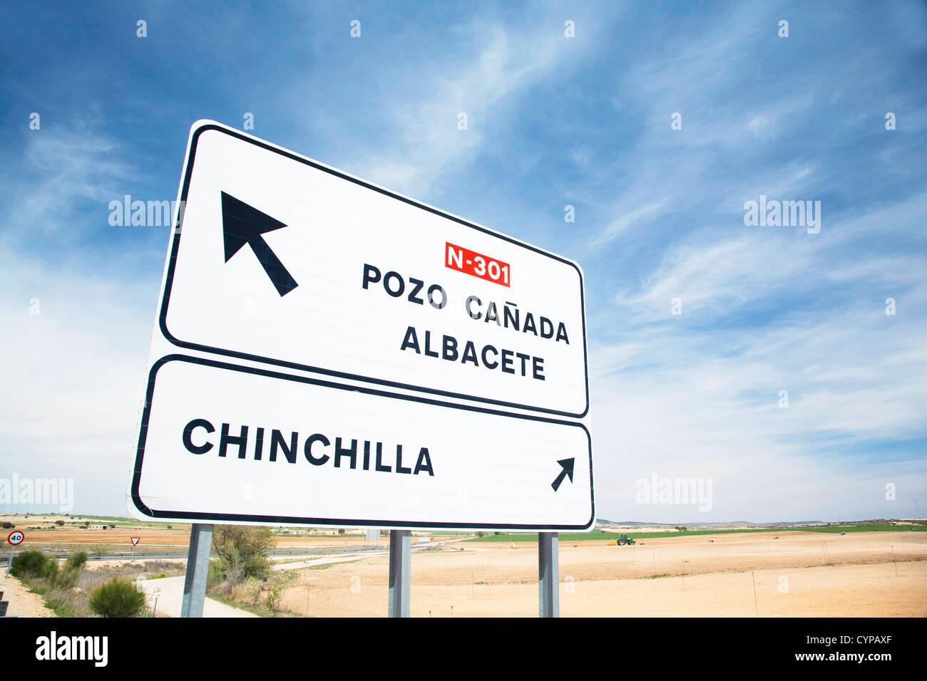 direction sign pointing cities at a highway of spain Stock Photo - Alamy