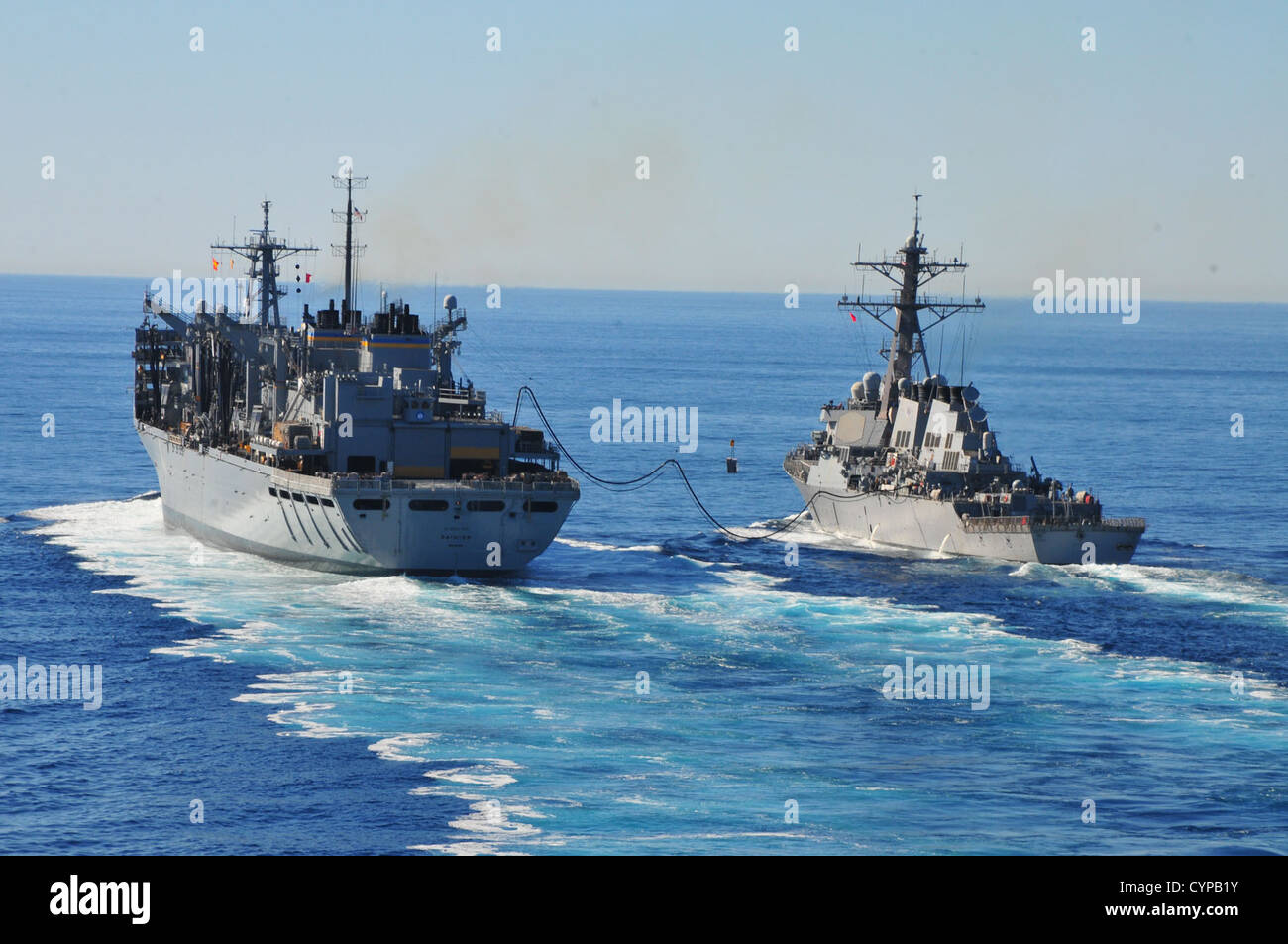 guided-missile destroyer USS Higgins (DDG 76) conducts a replenishment ...