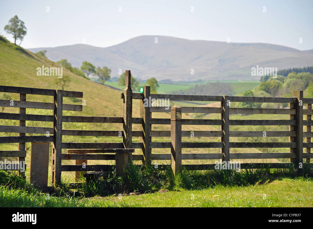 Fence and stile along country walk route Stock Photo - Alamy