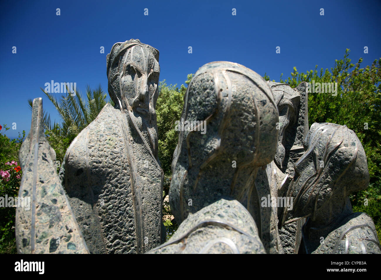 group of stone human statues in a park in crete Stock Photo - Alamy