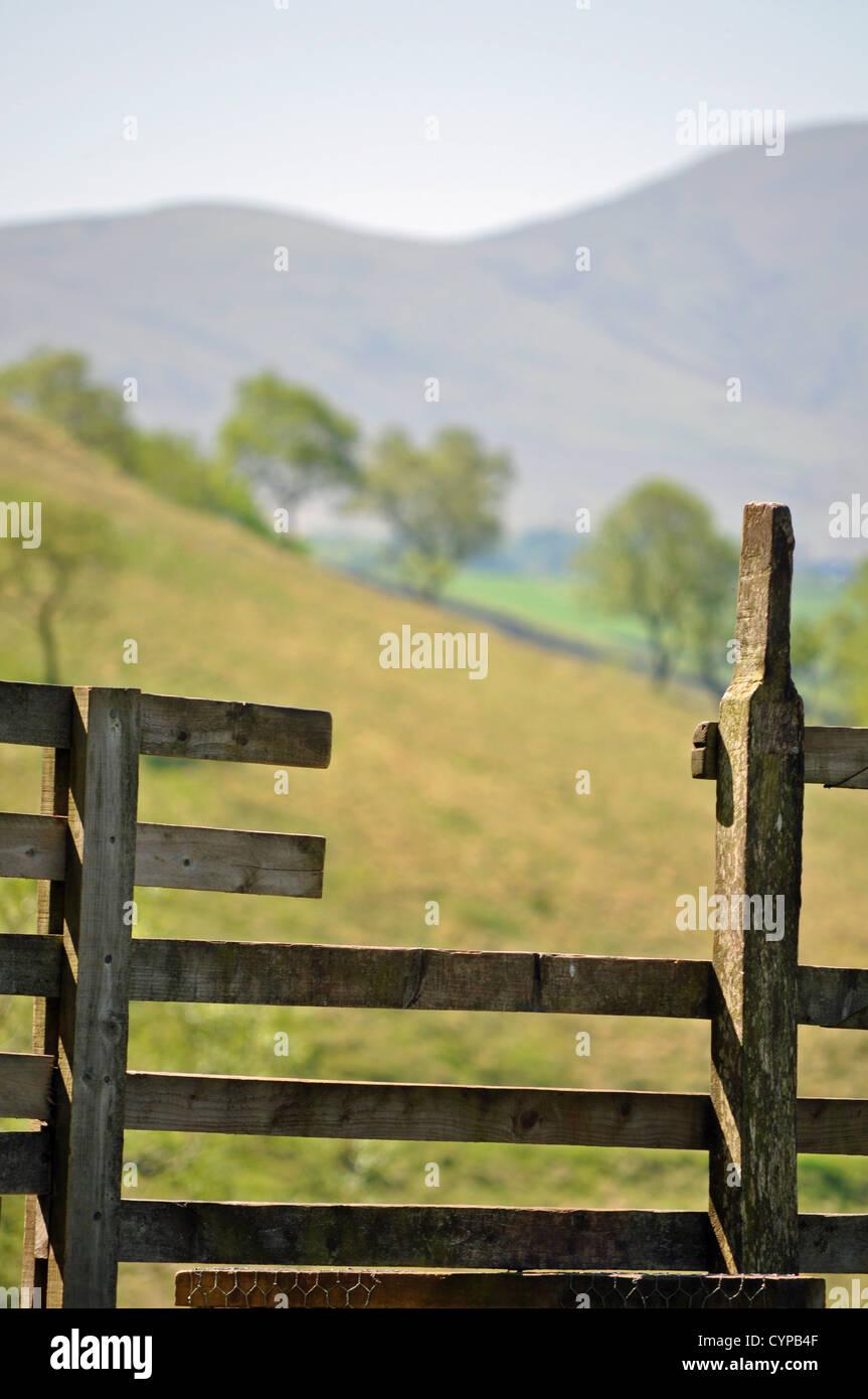 Fence and stile along country walk route Stock Photo - Alamy