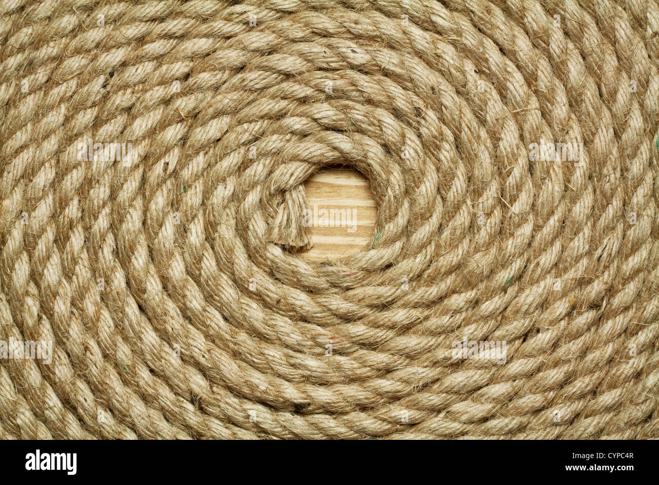 Roll of old rough rope, background Stock Photo - Alamy