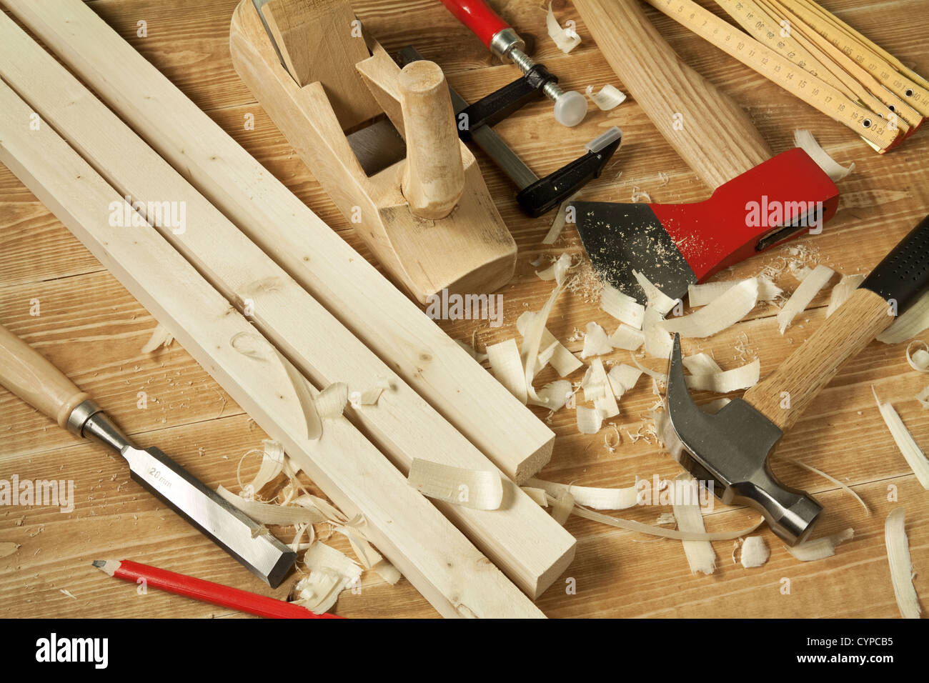 Wooden workshop table with tools Stock Photo - Alamy