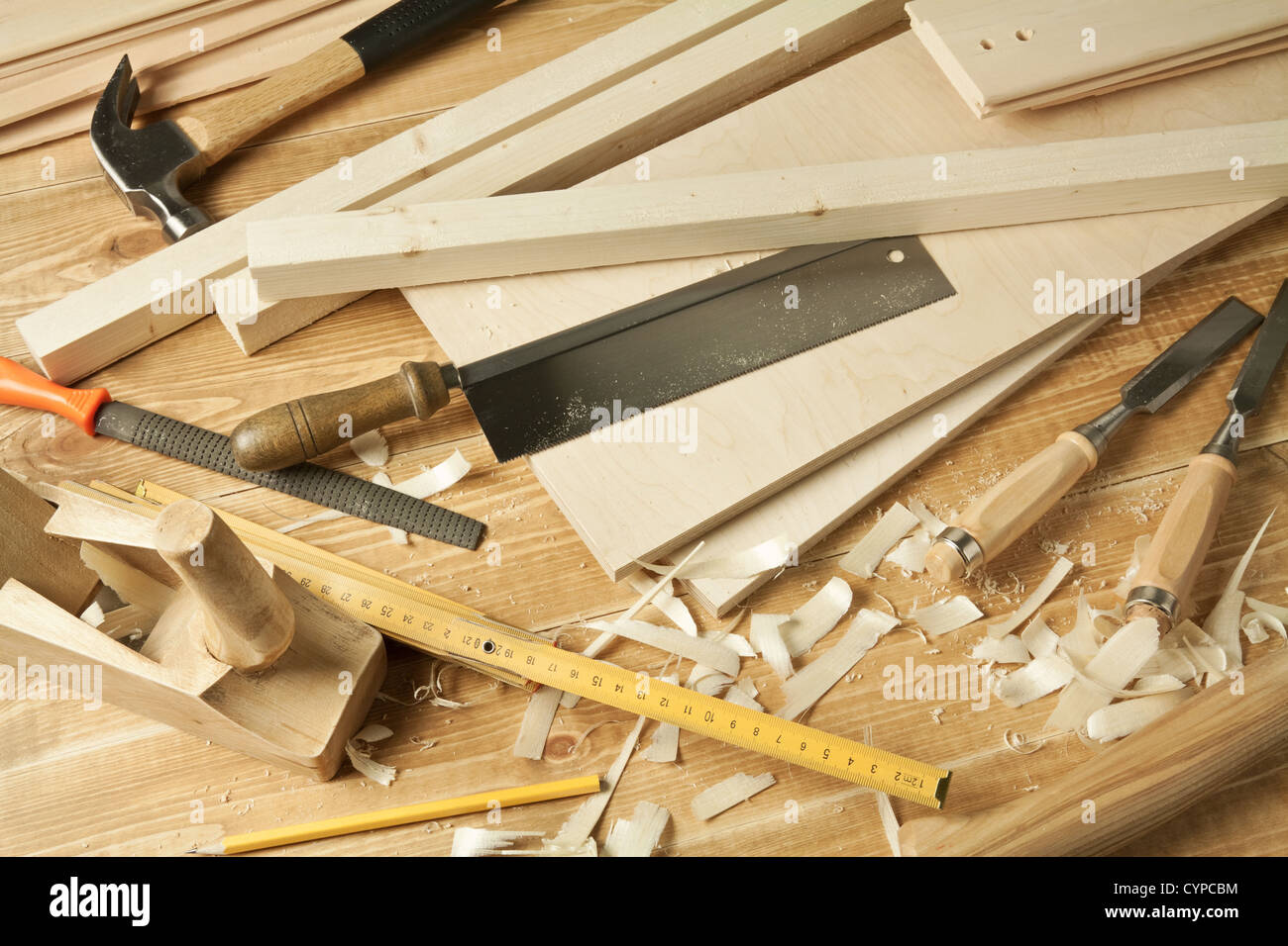Wooden workshop table with tools Stock Photo - Alamy